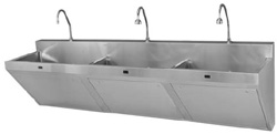 Wall hung scrub sinks with sensor activated faucets